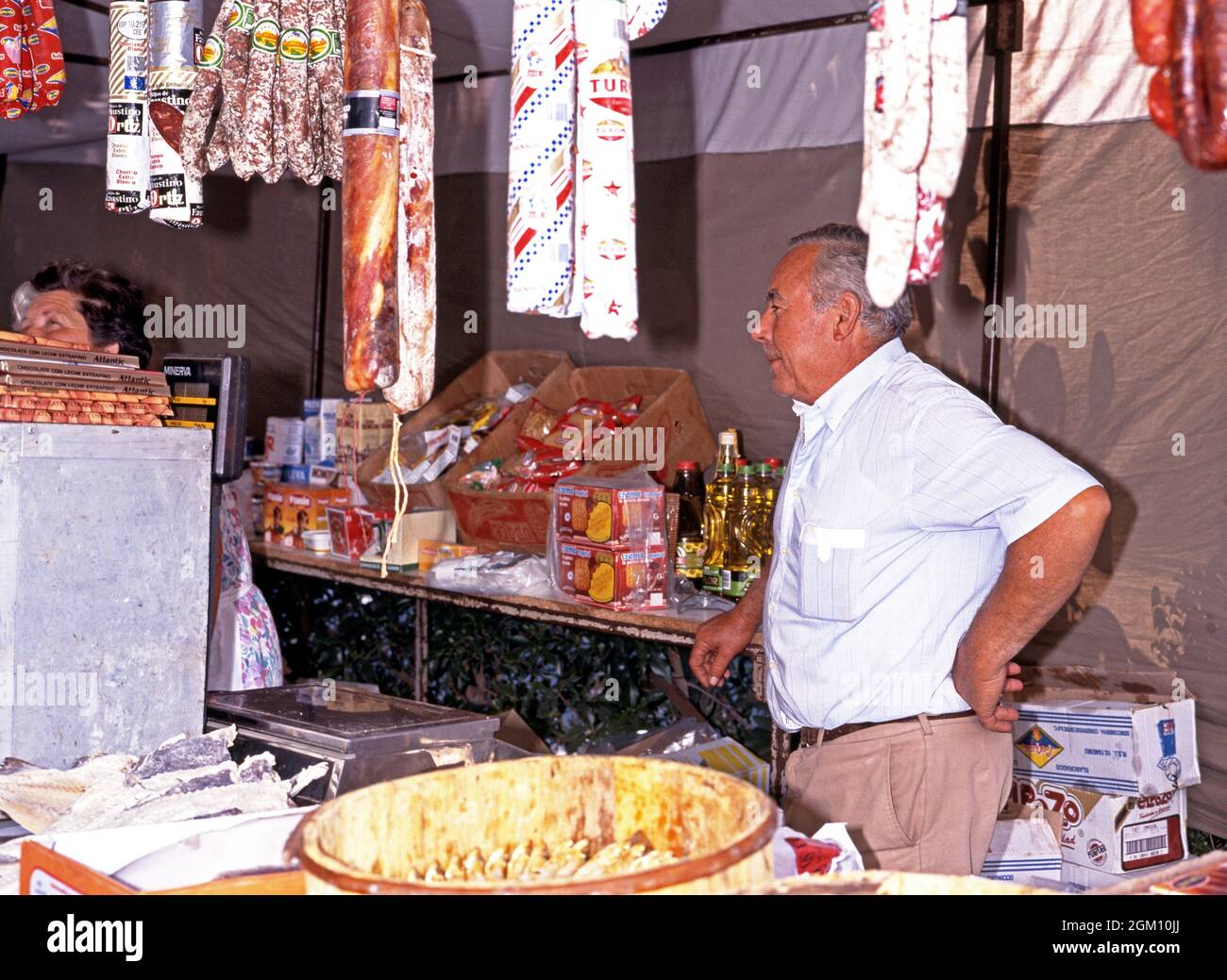 Market stall selling fish and cured meat (chorizo), Albox, Spain Stock ...