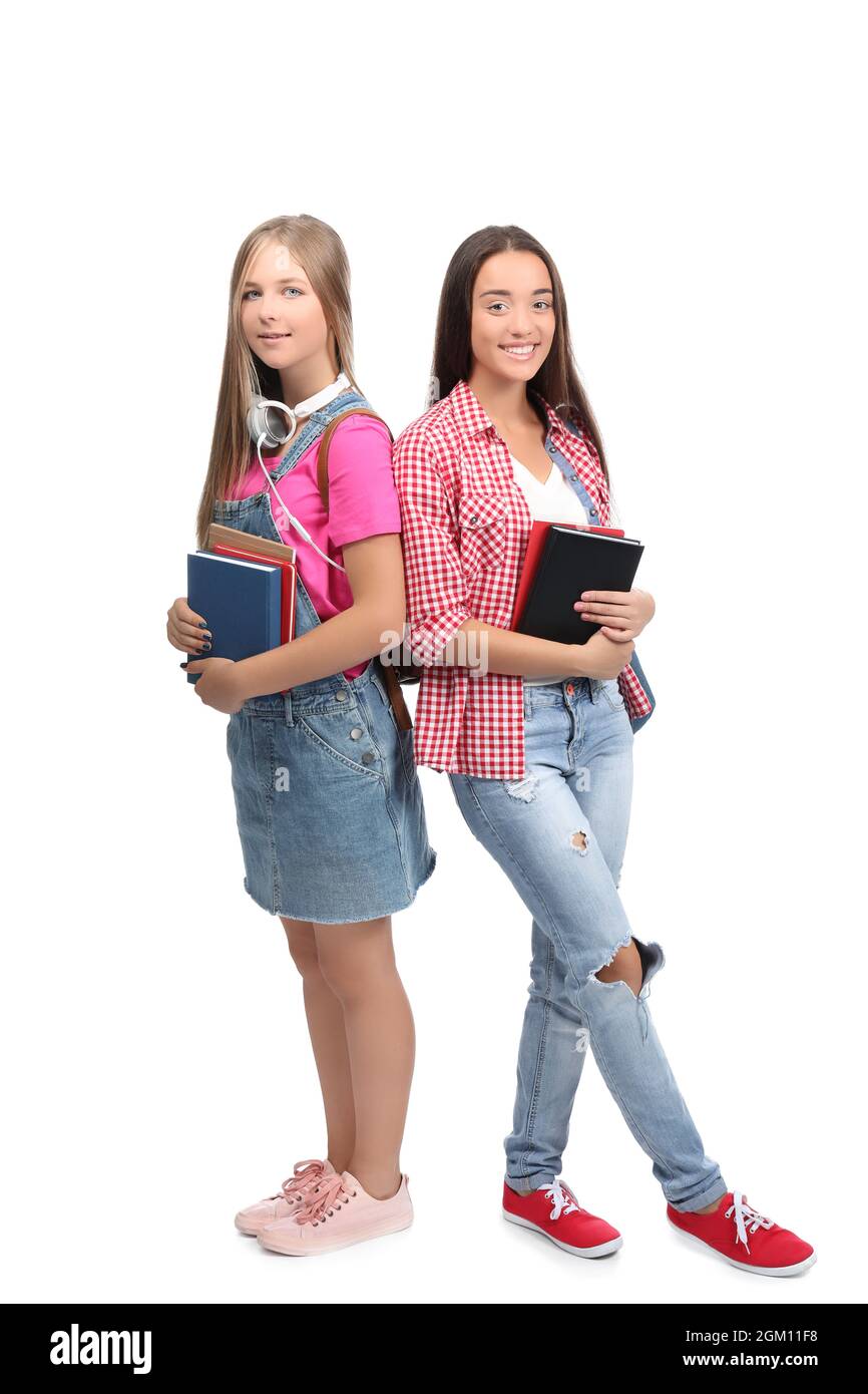 Pretty students on white background Stock Photo - Alamy