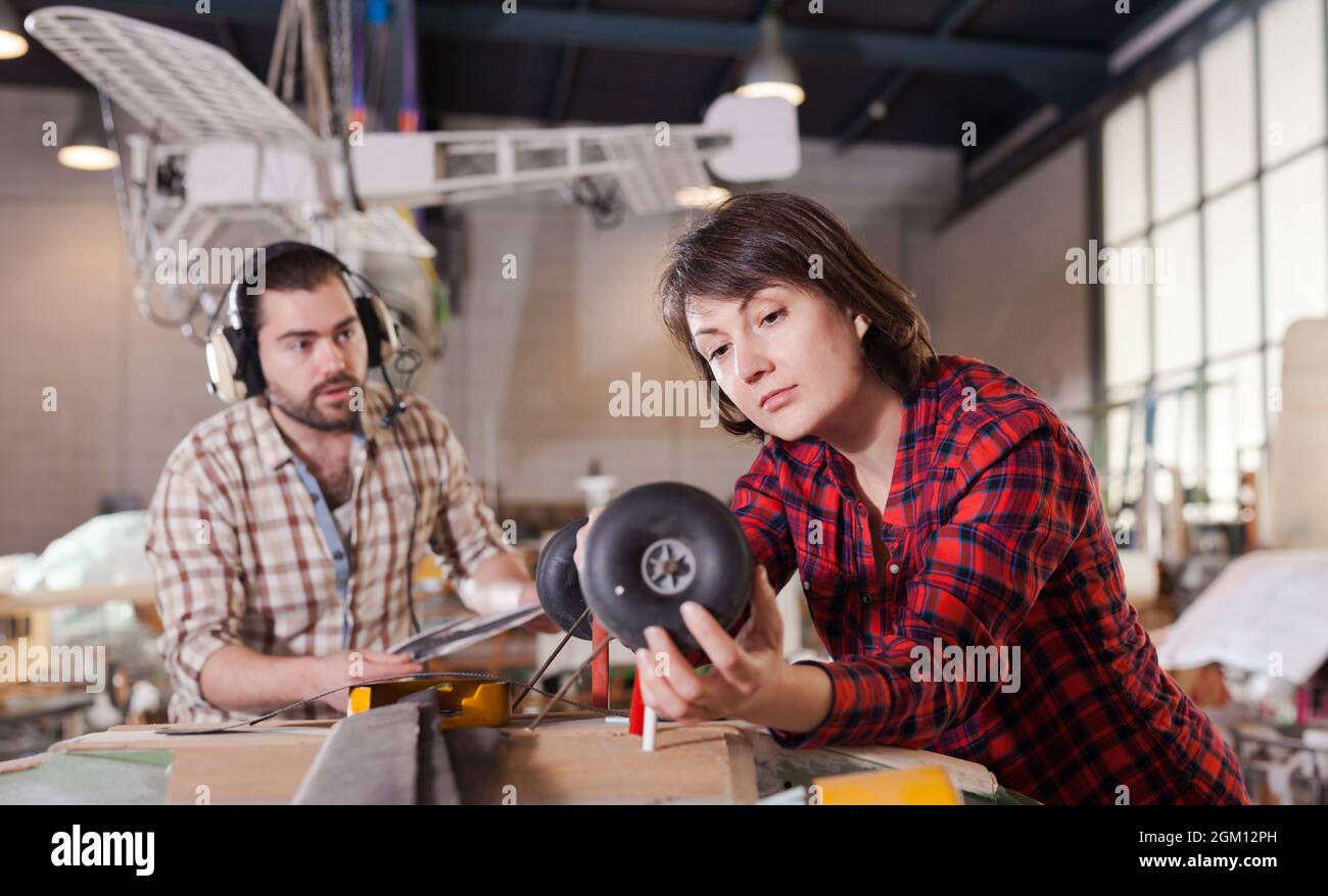 Woman modeling airplanes Stock Photo - Alamy