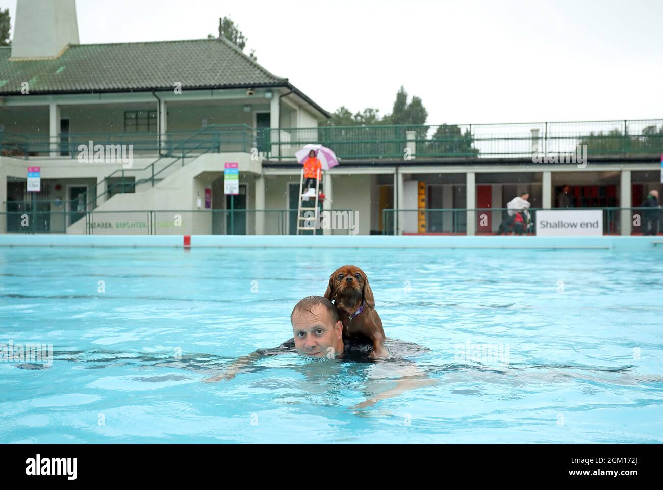 Peterborough, UK. 14th Sep, 2021. Adam Allan with River, a King Charles ...