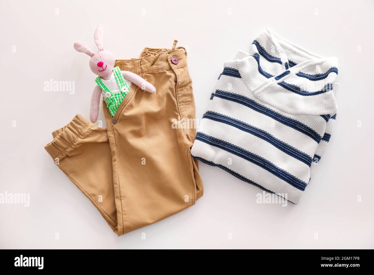 Composition with fashionable childish clothes on white background Stock ...