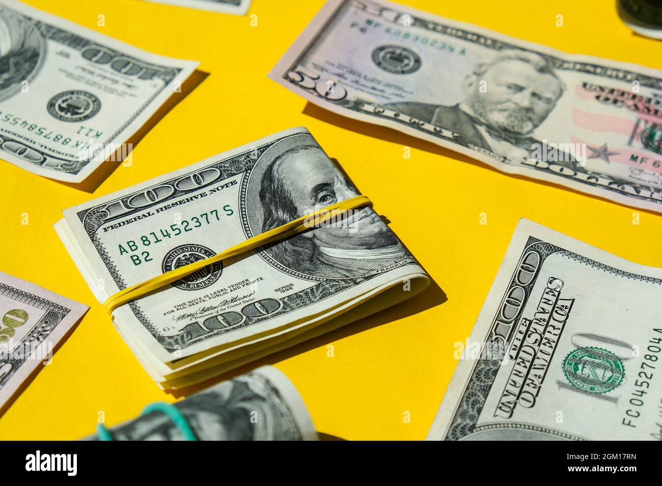 US dollars bundle close up isolated on dollar background. Paper ...