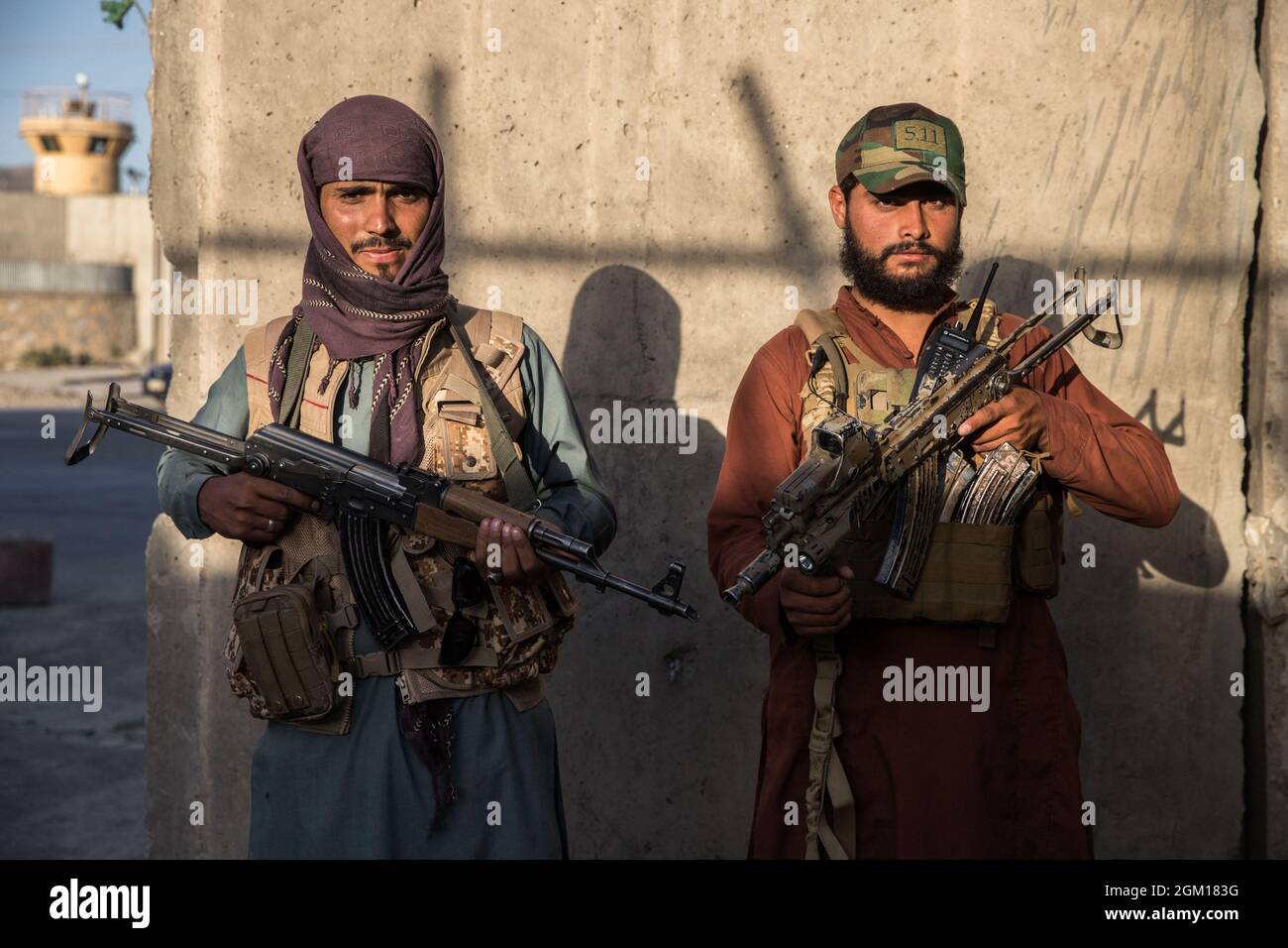 Two taliban fighters in charge of the security in Darullaman Palace in ...