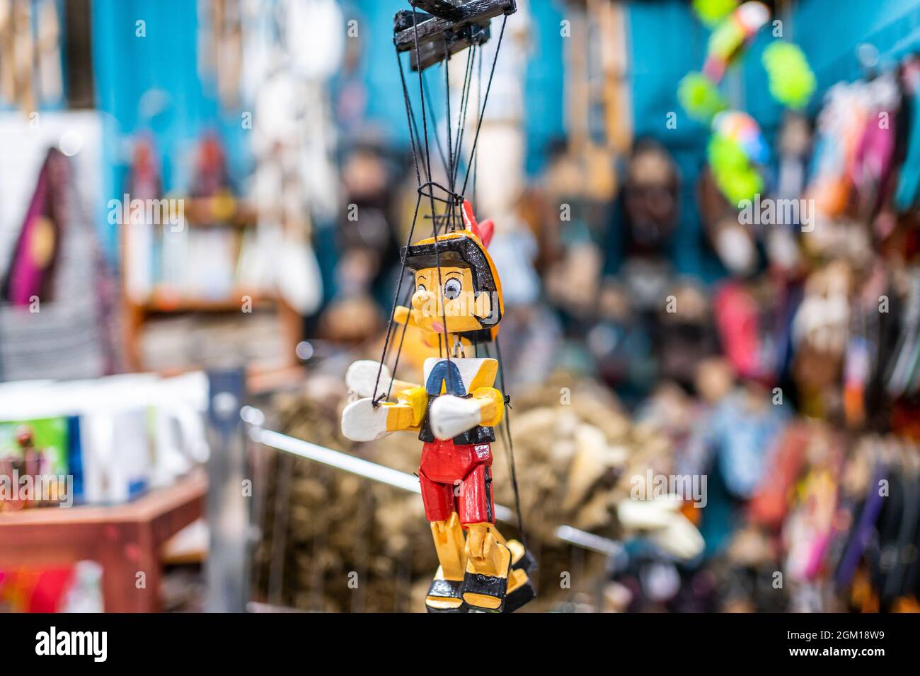 Pinocchio puppet on a toy stand in a market Stock Photo - Alamy