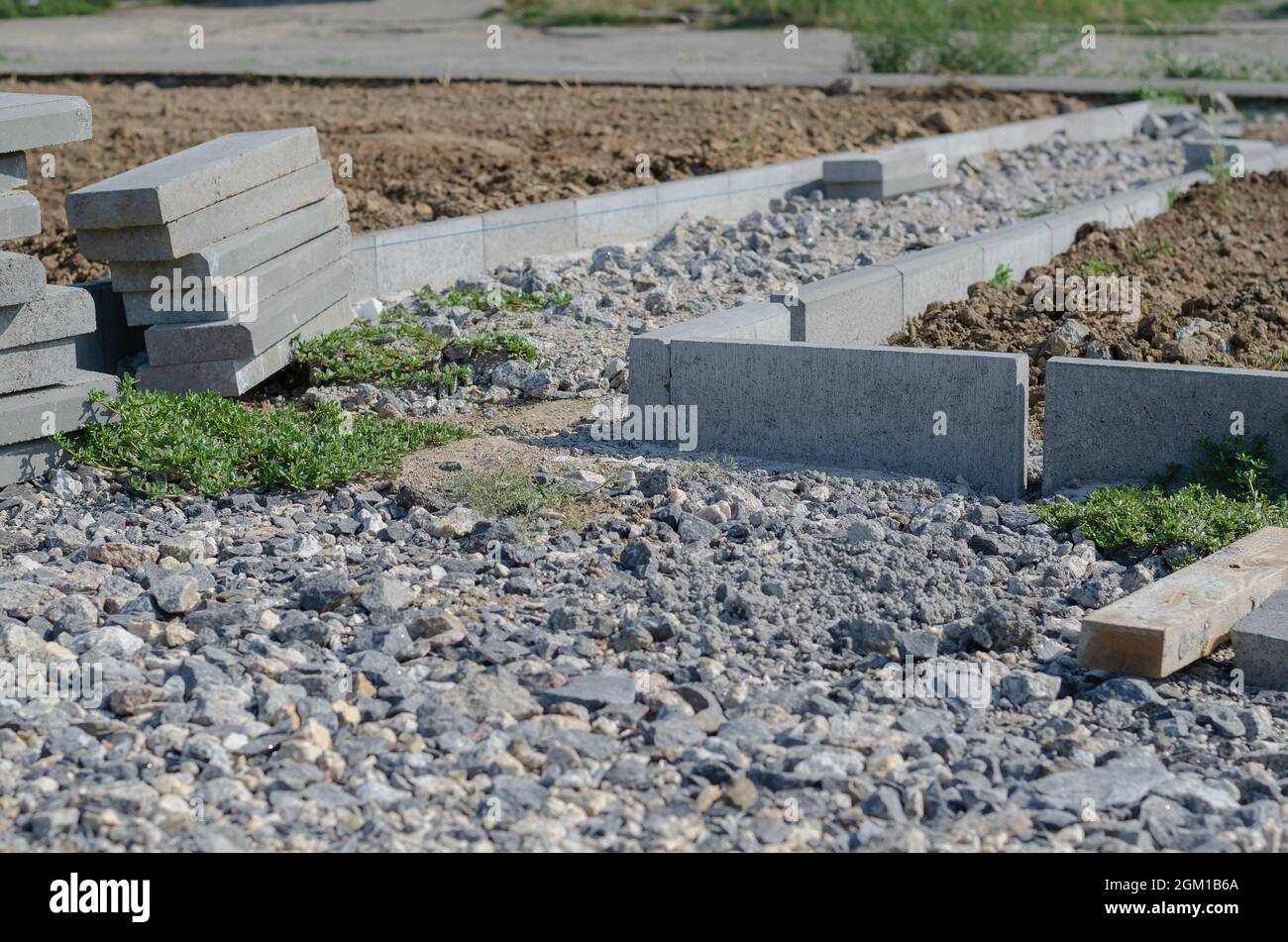 Plotted land parcel. Construction of new walkways. Gray concrete Stock ...