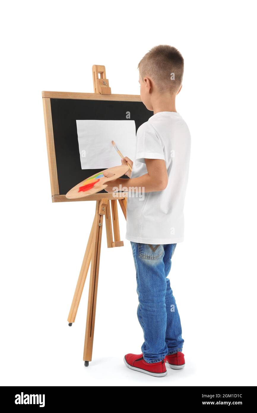 Cute little boy painting picture against white background Stock Photo ...