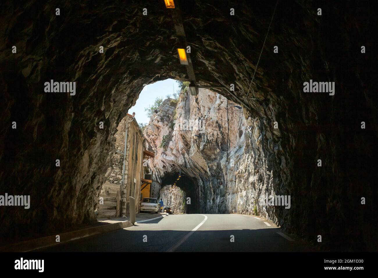 Road tunnel through rock Stock Photo - Alamy