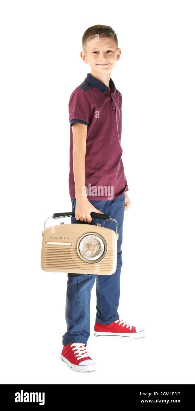 Adorable little boy with vintage radio on white background Stock Photo ...