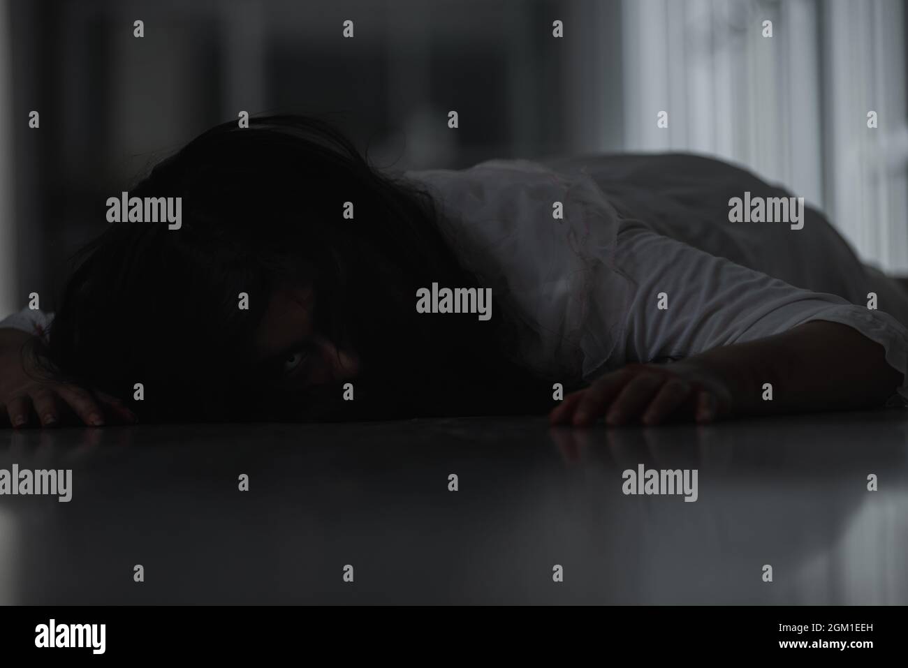 Horror evil woman ghost creepy lying dead in a dark room at house ...