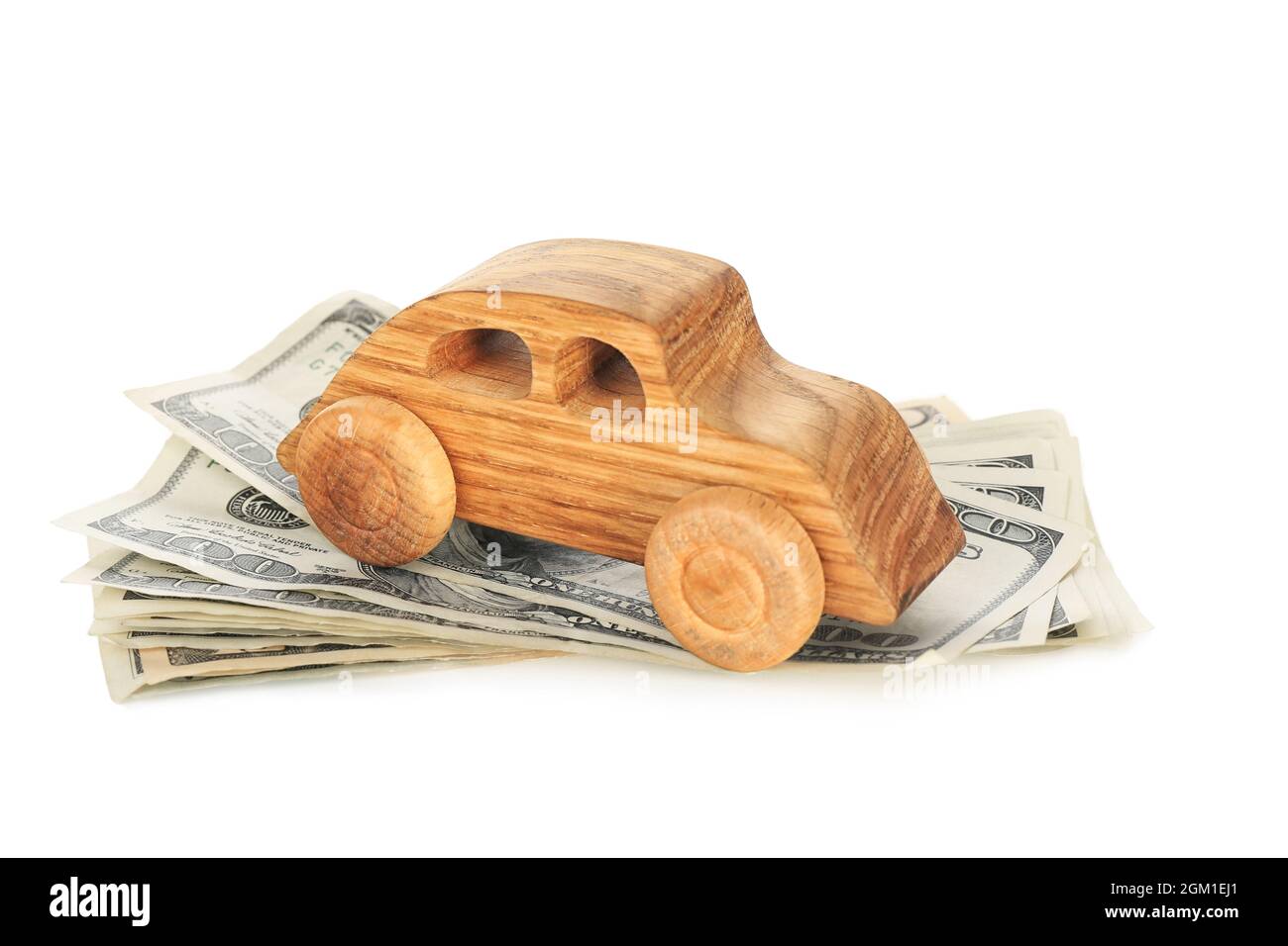 Wooden toy car and cash on white background. Buying car concept Stock ...