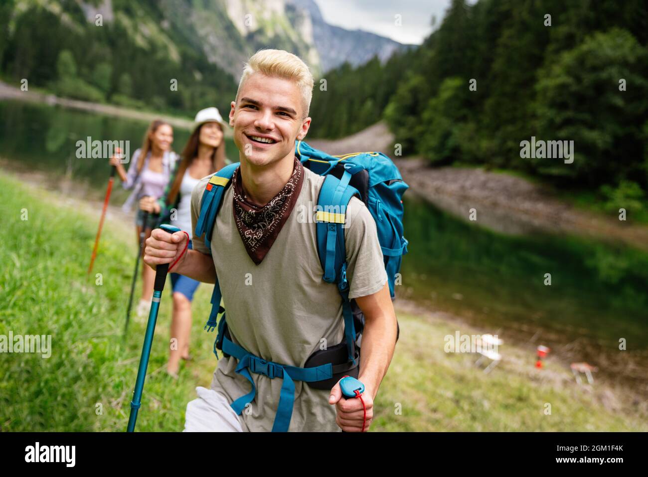 Group of happy friends enjoying outdoor activity together Stock Photo ...