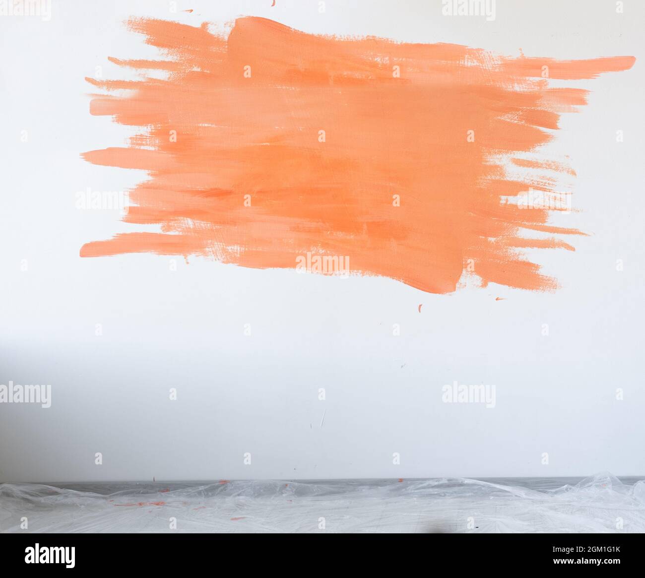 home renovation concept, big orange spot on white wall Stock Photo - Alamy