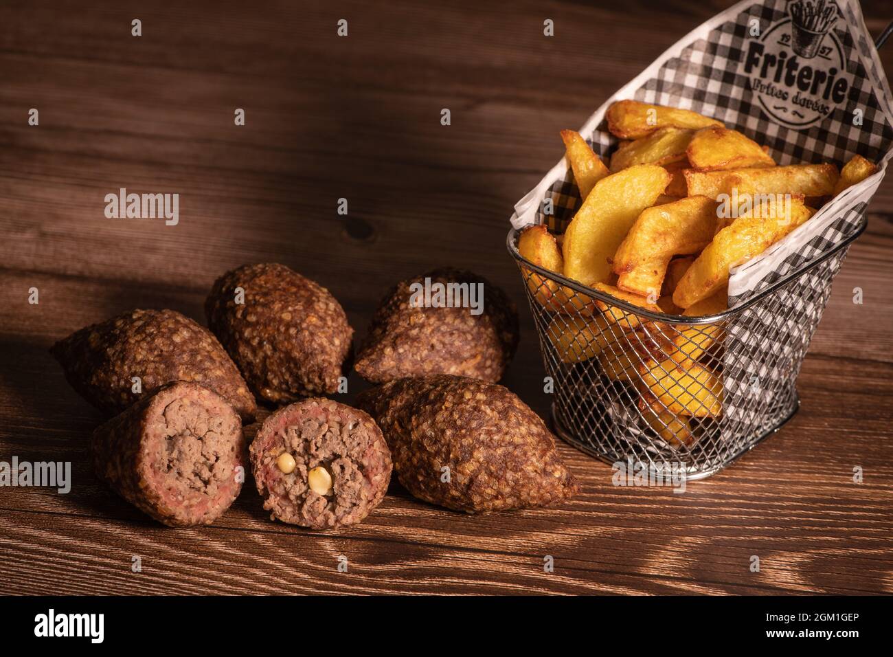 Traditional kebbe and pita bread on big round plate in lebanese ...