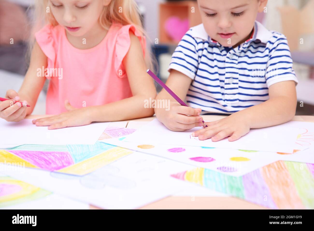 Cute little children drawing at home Stock Photo - Alamy