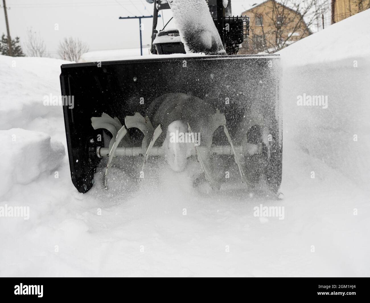 Clearing snow with a snowblower after a heavy snowfall Stock Photo - Alamy