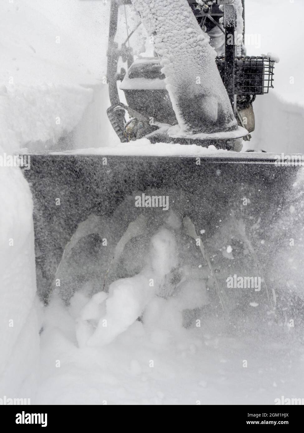 Clearing snow with a snowblower after a heavy snowfall Stock Photo - Alamy