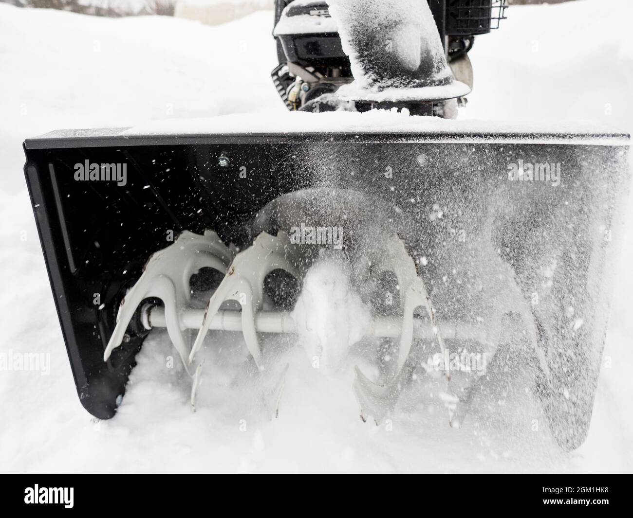 Clearing snow with a snowblower after a heavy snowfall Stock Photo - Alamy