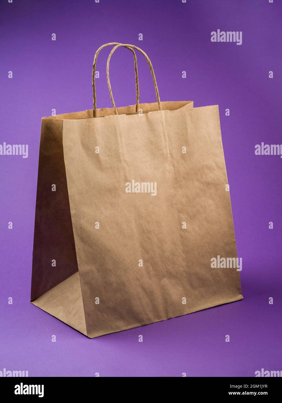 A blank brown bag isolated Stock Photo - Alamy
