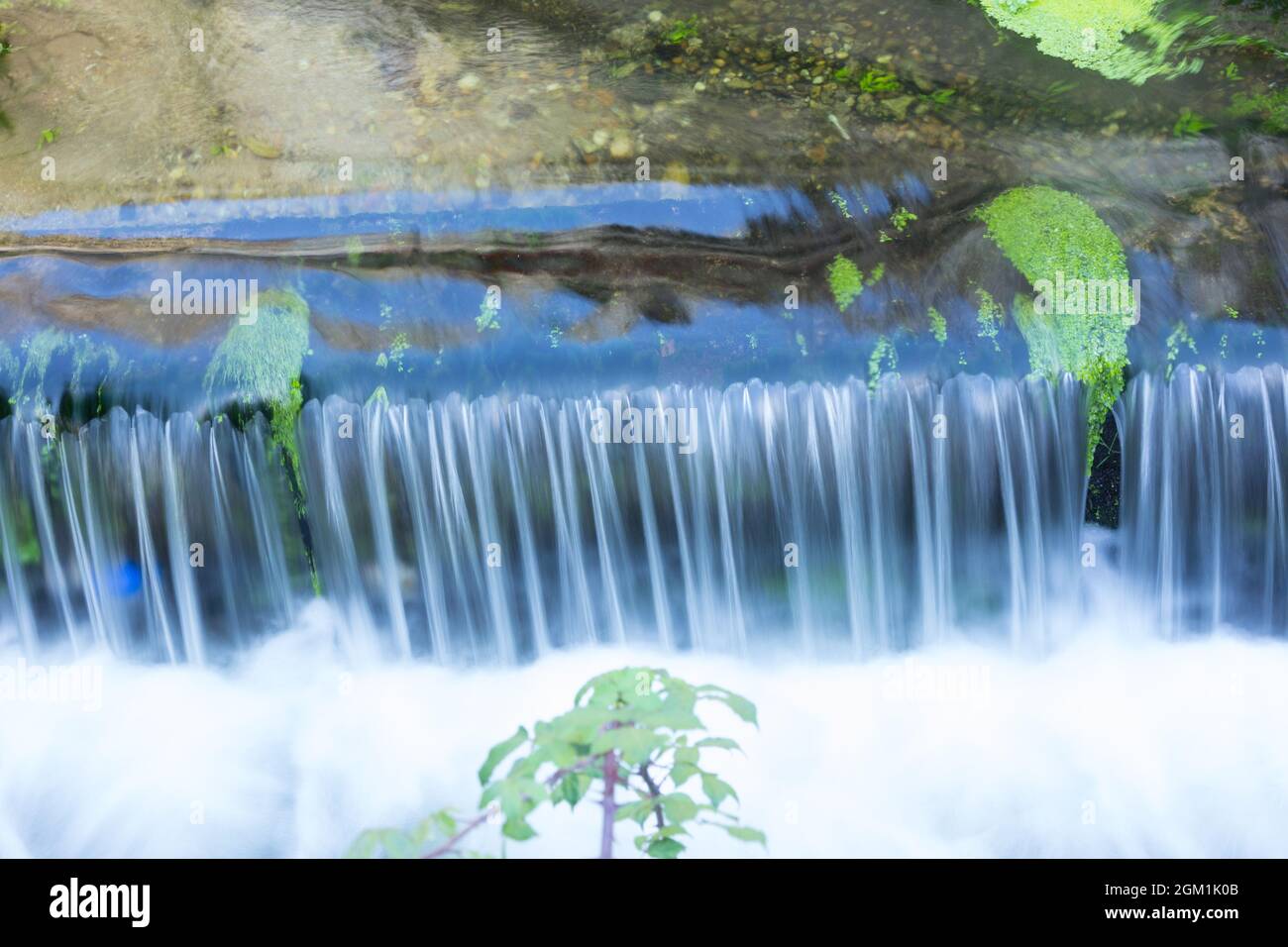 Small waterfalls; waterfalls. Nature. Foam generated by the waterfall ...