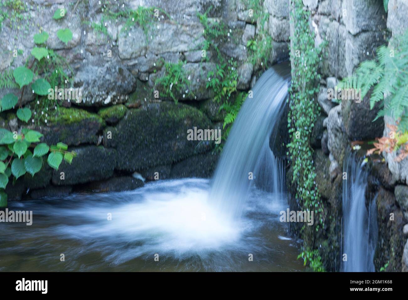 Small waterfalls; waterfalls. Nature. Foam generated by the waterfall ...
