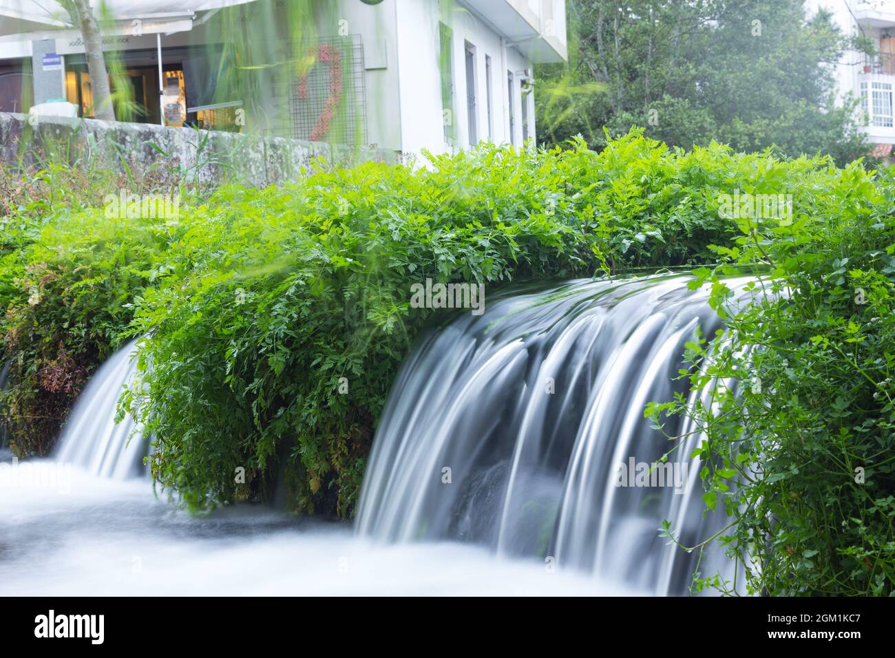 Small waterfalls; waterfalls. Nature. Foam generated by the waterfall ...
