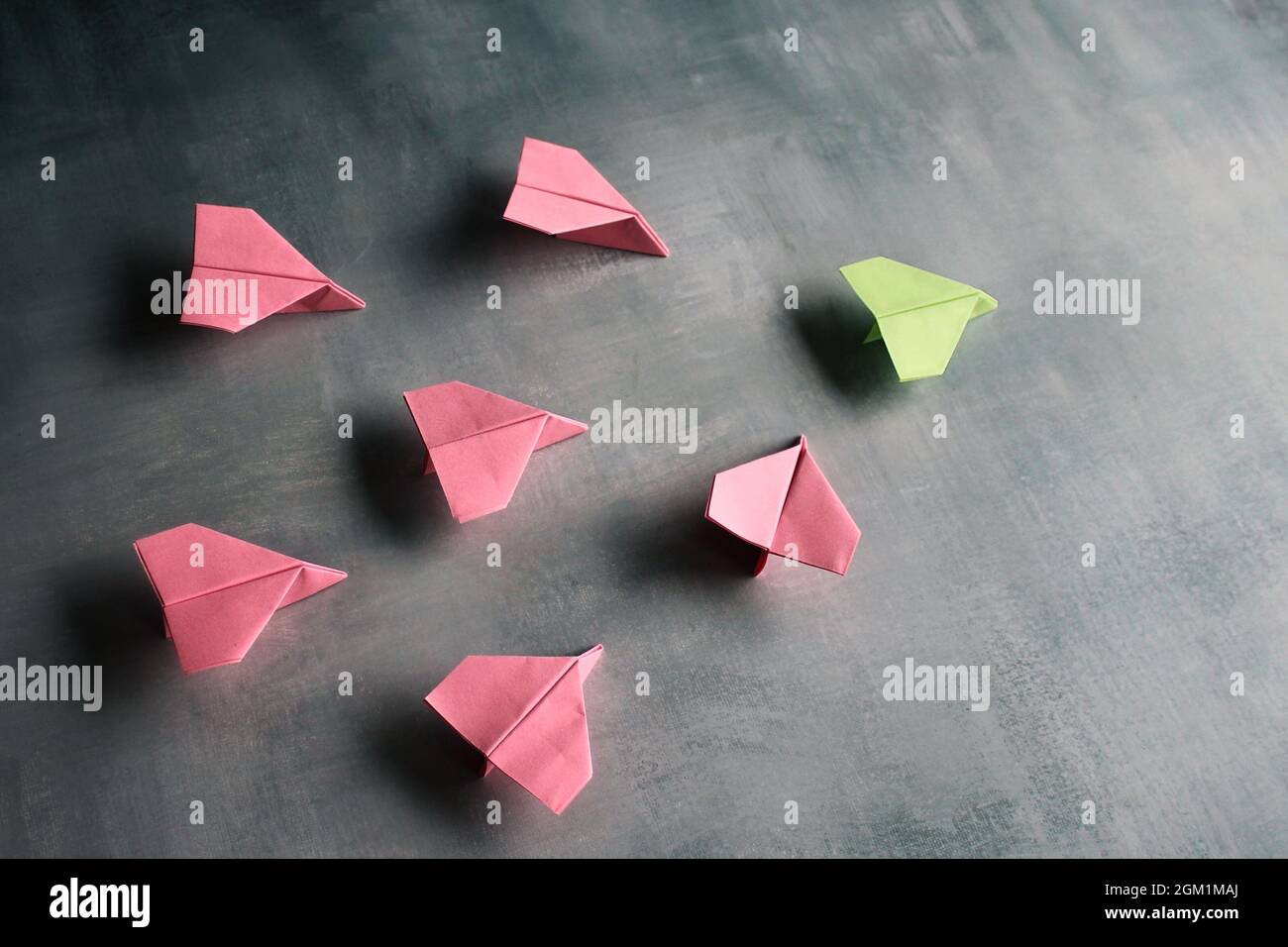 Leadership, cooperation, teamwork and followers concept. Red paper ...