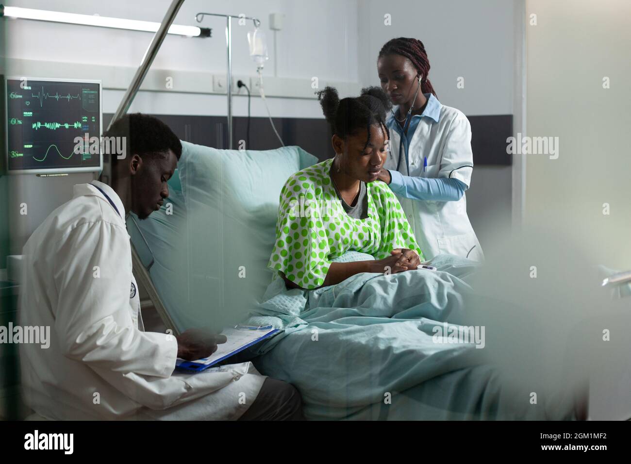 African american medical team working on healing patient in hospital ...