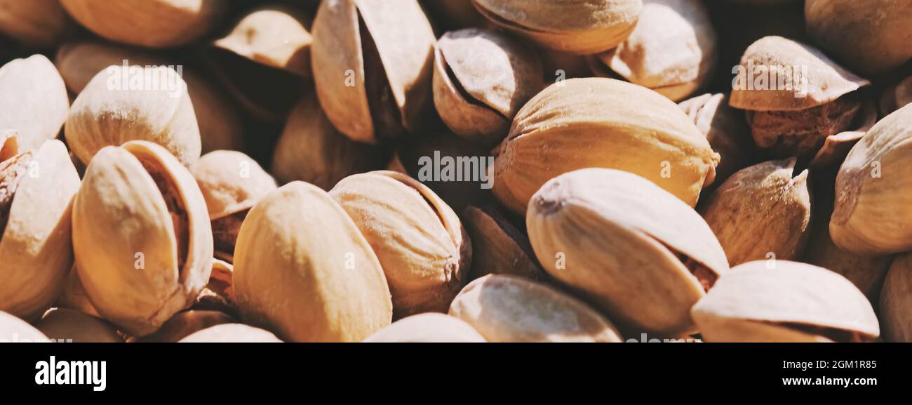 Organic pistachios in the sun, healthy food and snack background Stock ...