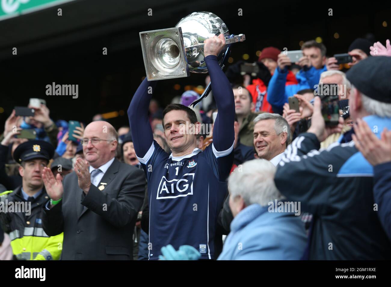 Stephen Cluxton lifts the National League trophy after the final in ...