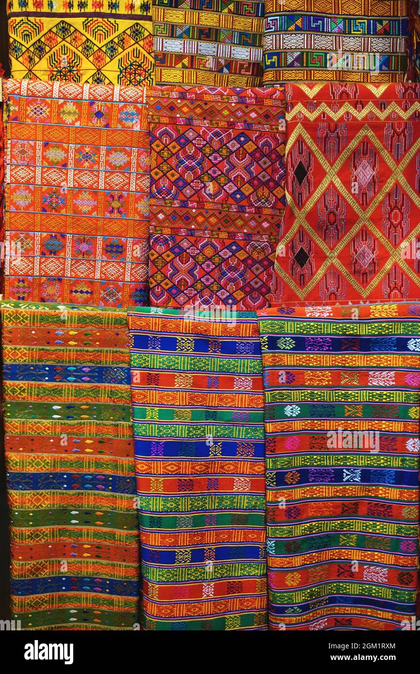 Collection of brilliant colored Bhutanese handwoven and embroidered ...