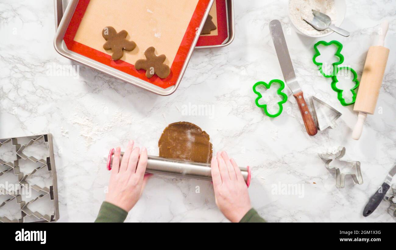 Flat lay. Step by step. Rolling out gingerbread cookie dough to bake ...