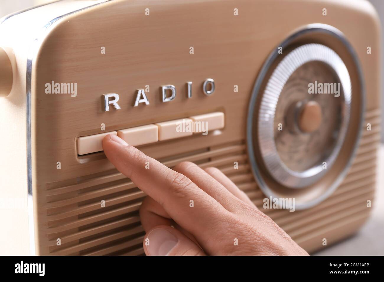Old man tuning radio hi-res stock photography and images - Alamy
