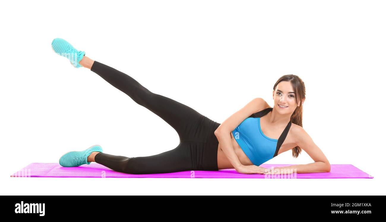 Beautiful young woman doing exercises, isolated on white Stock Photo ...
