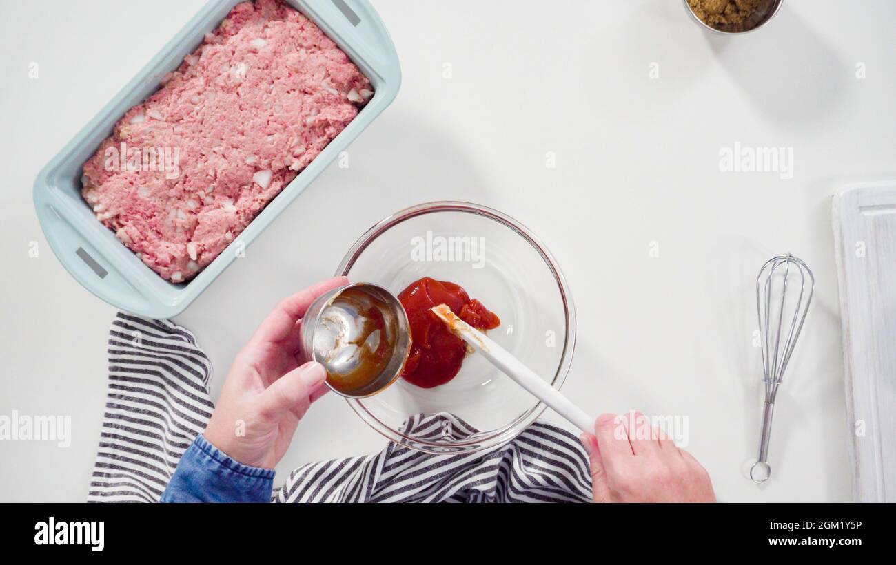 Flat lay. Step by step. Mixing ingredients for a classic beef meatloaf ...