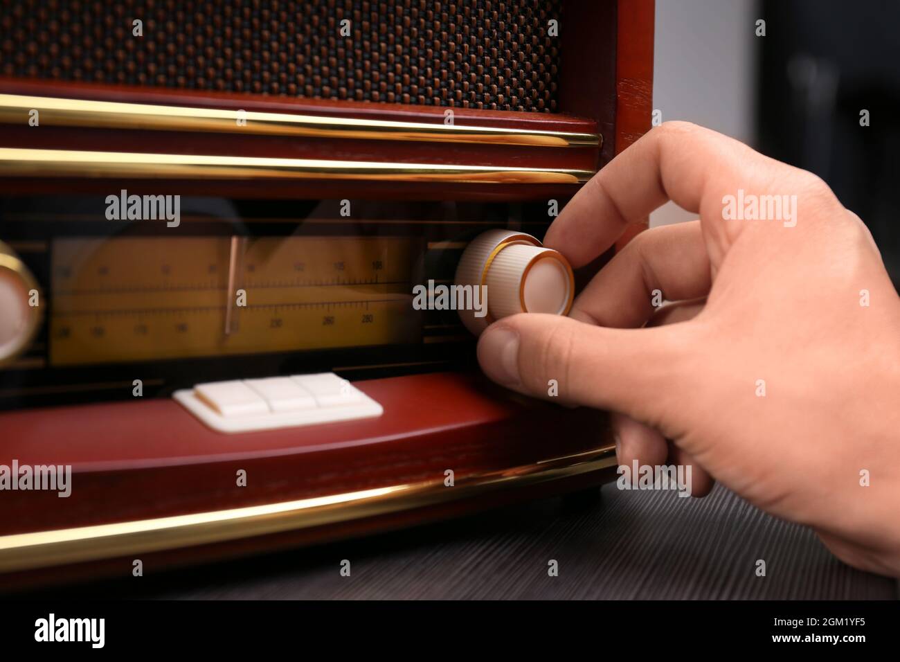 Old man tuning radio hi-res stock photography and images - Alamy