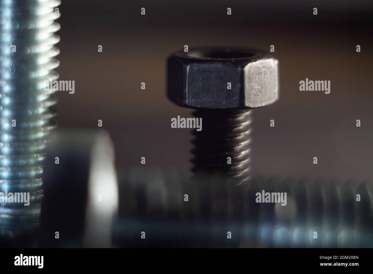 Closeup of the details of the bolts. Bolts and hex nuts Stock Photo - Alamy