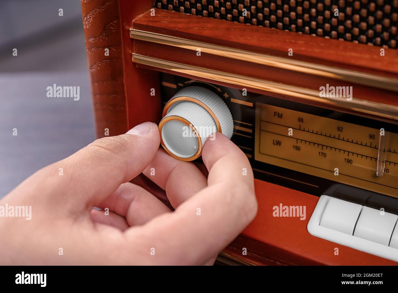 Person tuning retro radio, closeup Stock Photo - Alamy