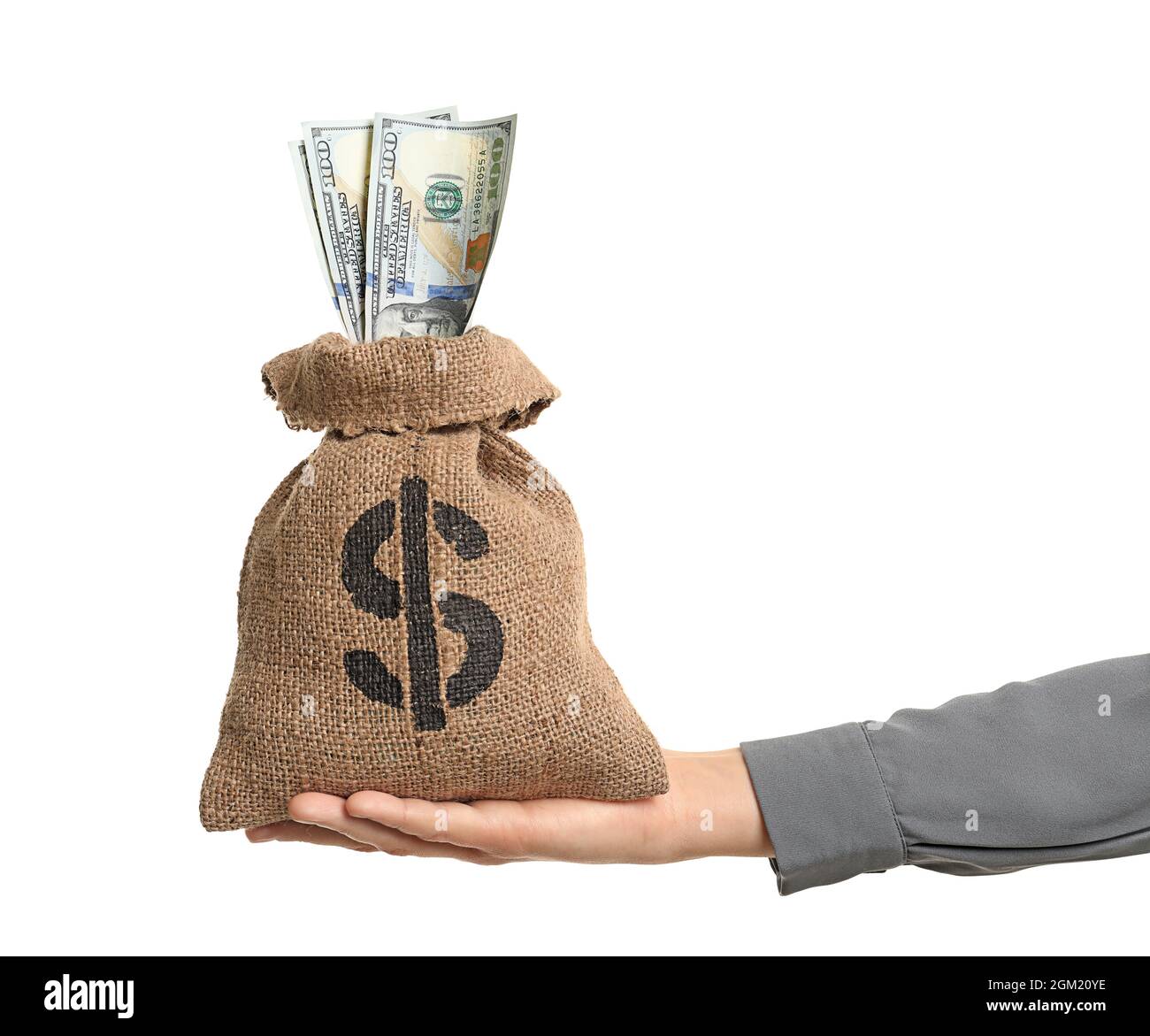 Woman holding sack of dollars, isolated on white Stock Photo - Alamy