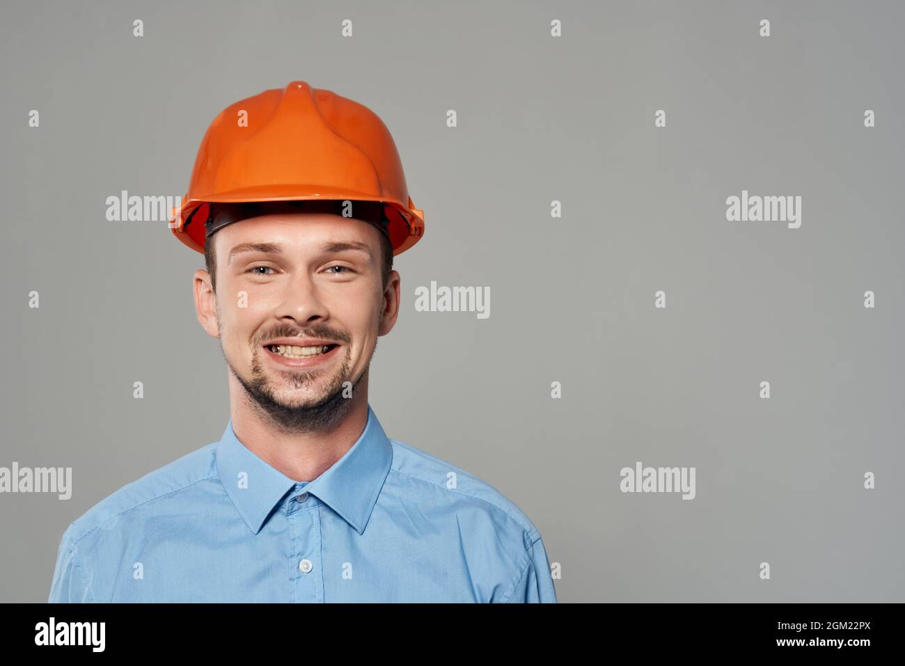 male builders blueprints builder light background Stock Photo - Alamy