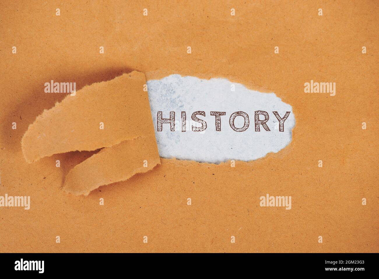 The word History on a ripped paper Stock Photo - Alamy