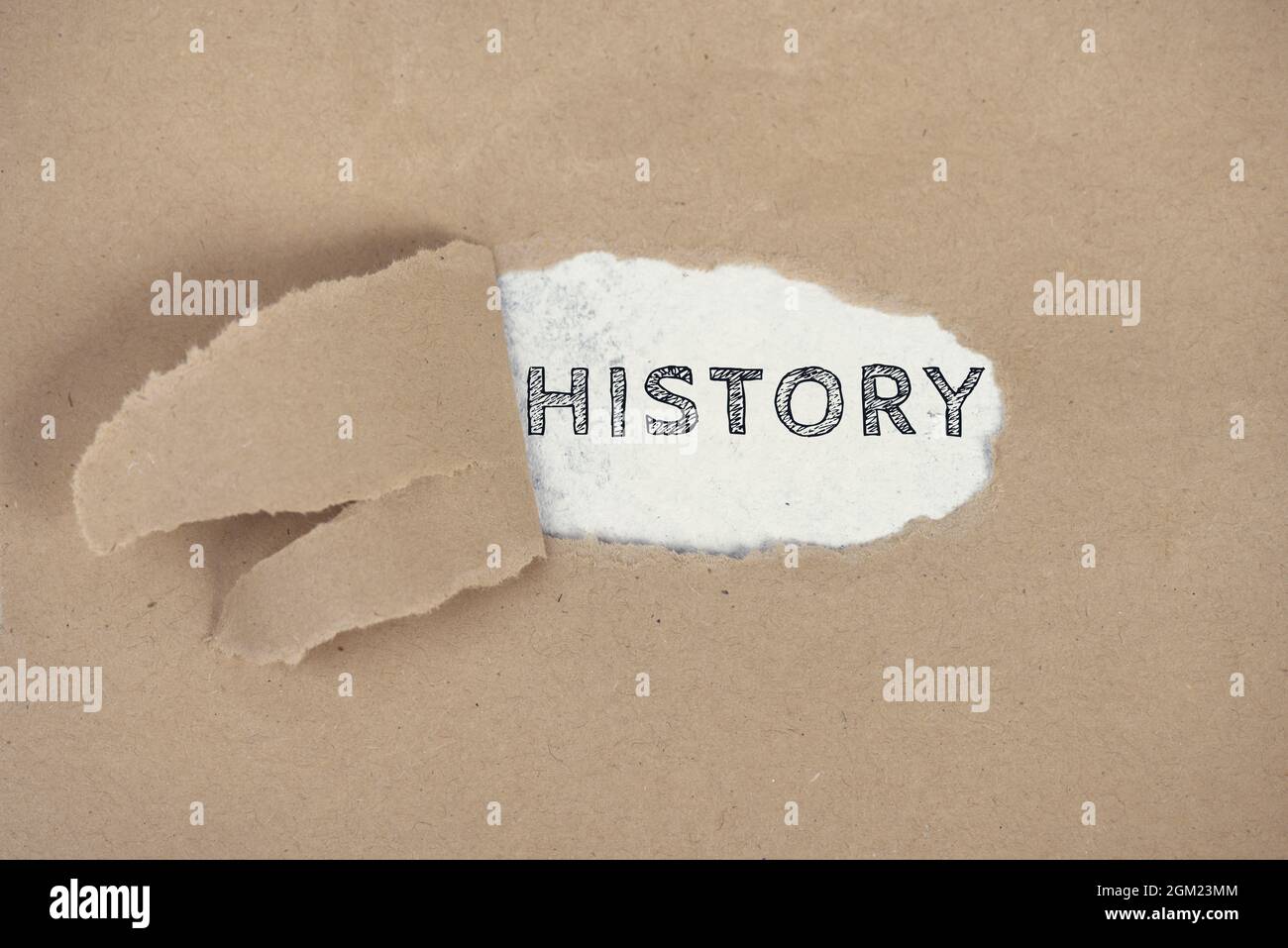 The word History on a ripped paper Stock Photo - Alamy