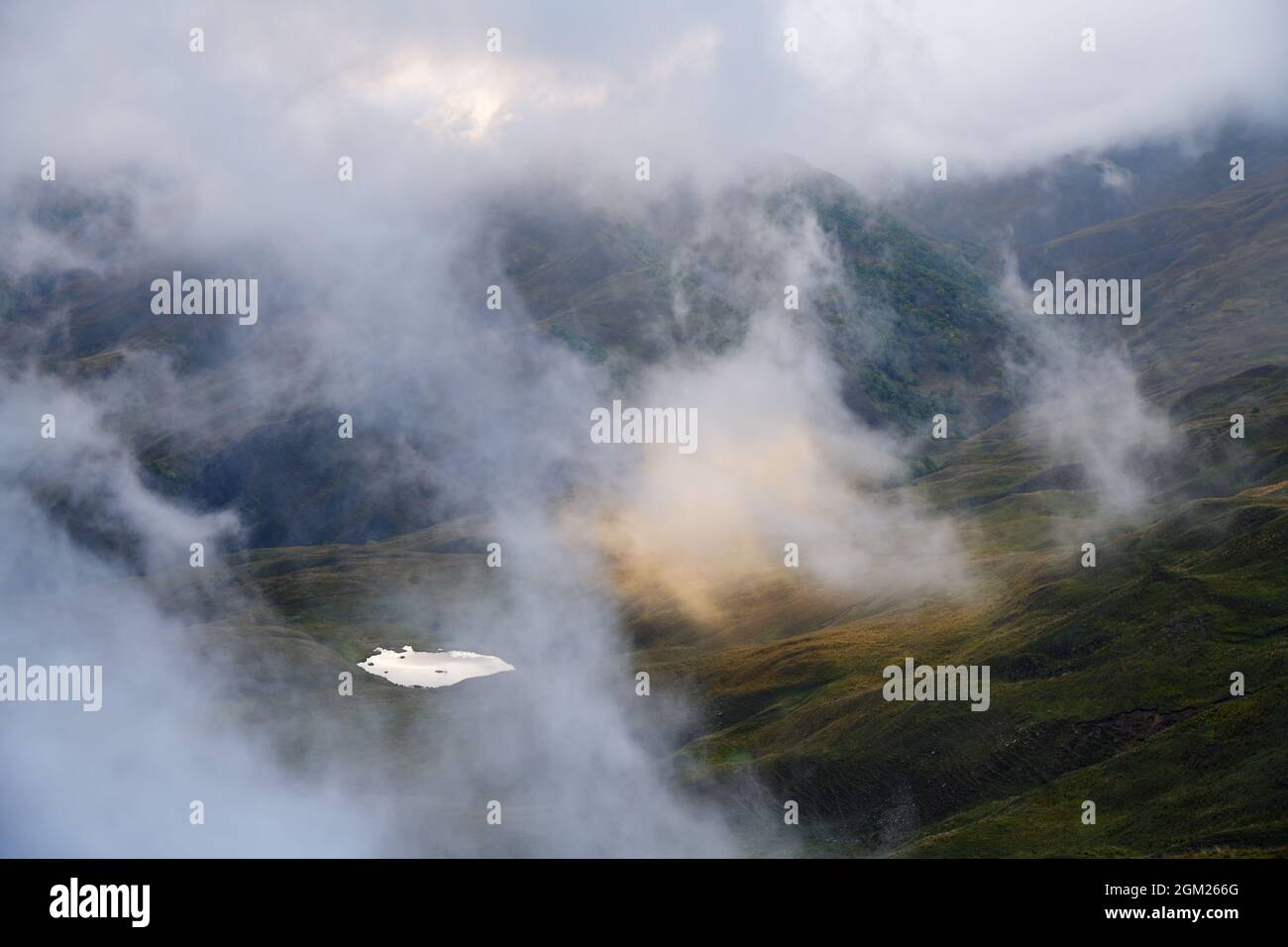 Caucasus alpine meadow, lake and mountains landscape in Chechnya ...