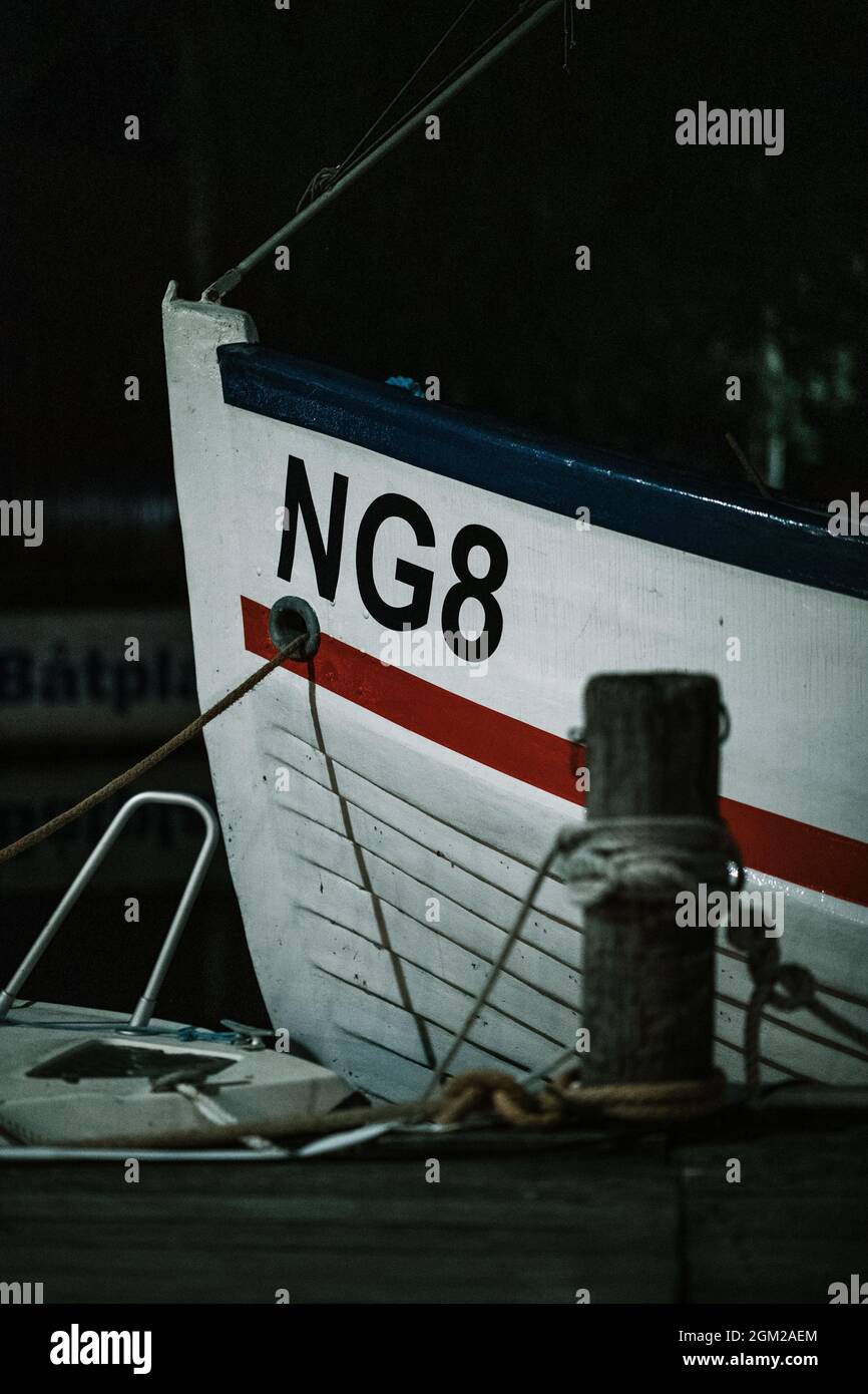 Front part of a boat in a small town harbour Stock Photo - Alamy