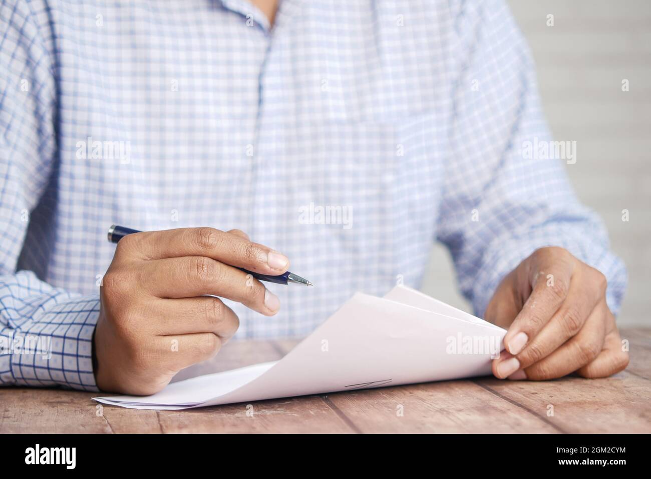 man hand in fountain pen writing or signature on paper Stock Photo - Alamy