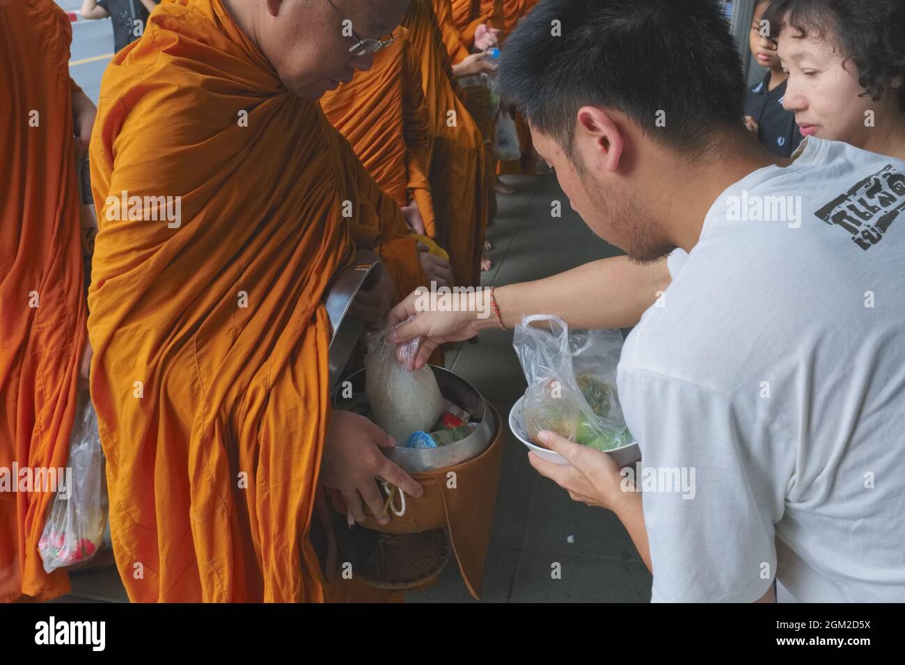 Buddhist monks and layman hi-res stock photography and images - Alamy