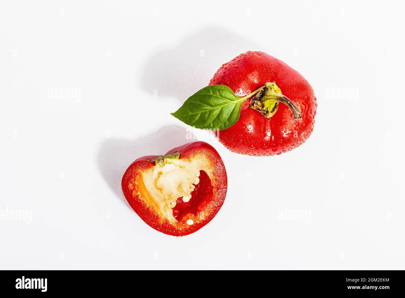 Ripe red round peppers isolated on white background. Fresh vegetables ...