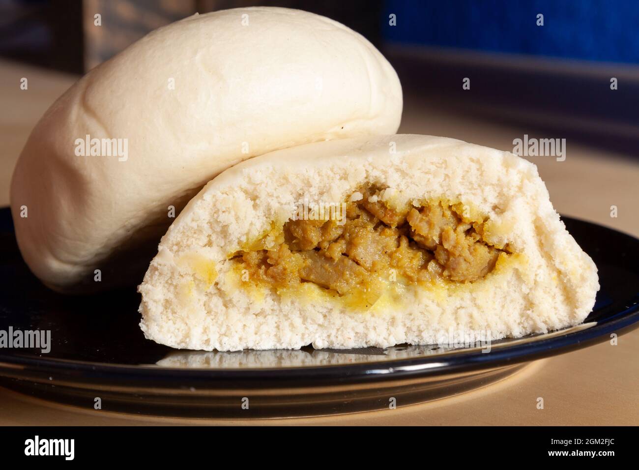Delicious Bao bread served on a plate Stock Photo - Alamy