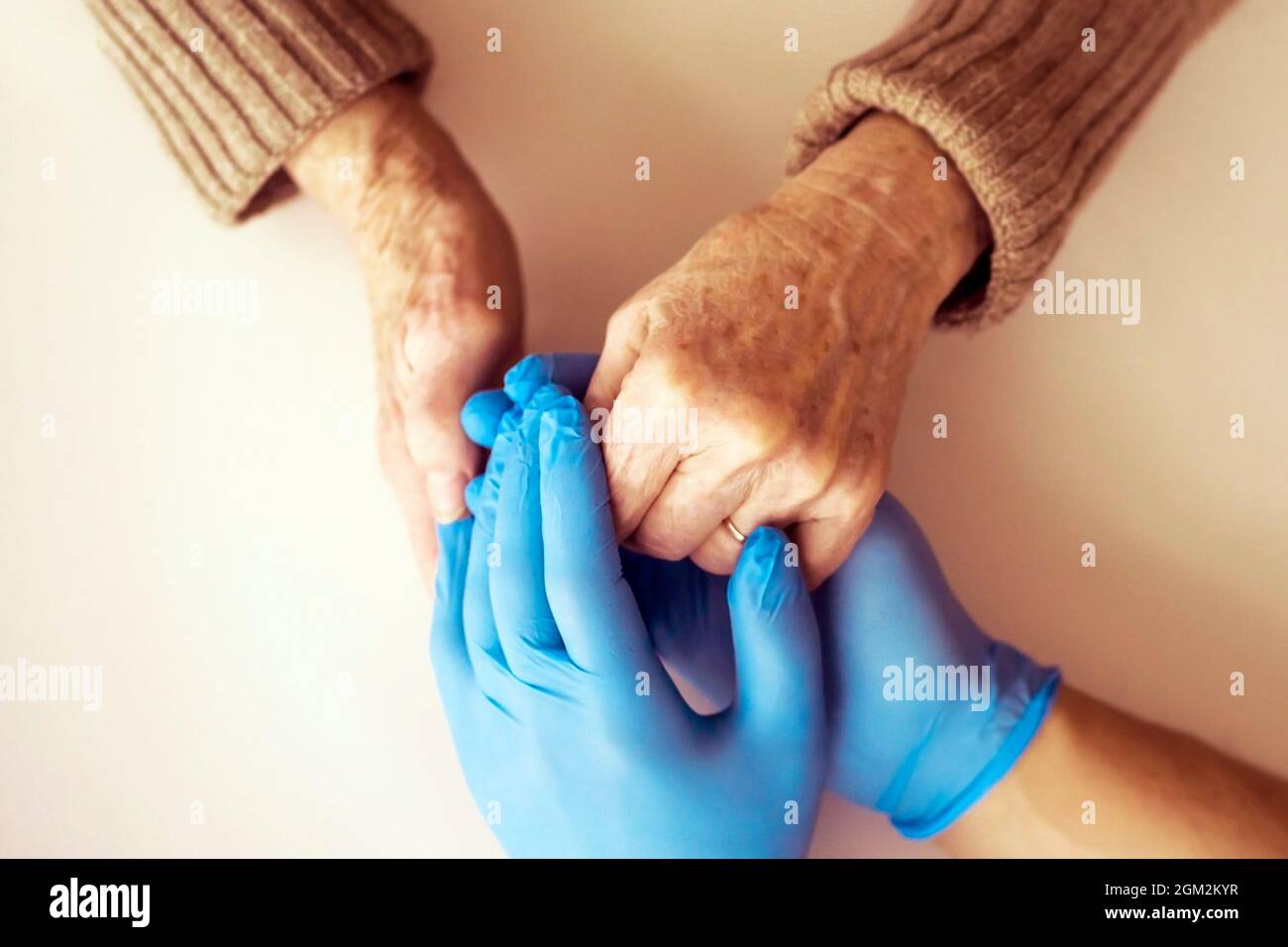 Handshake, caring, trust, treatment and support Stock Photo - Alamy