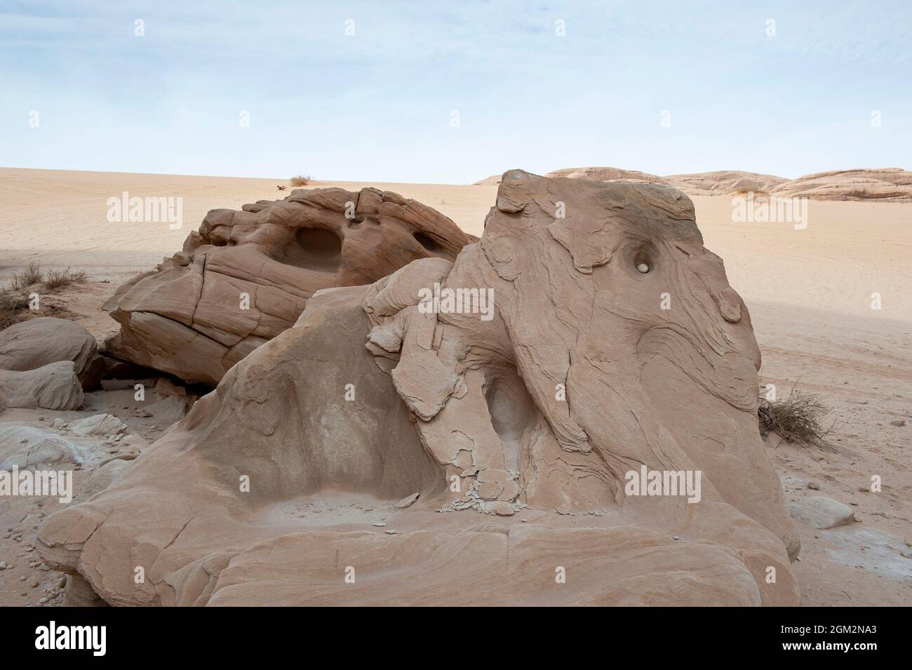Sandstone rock formations of crazy shapes in the desert near Medina and ...