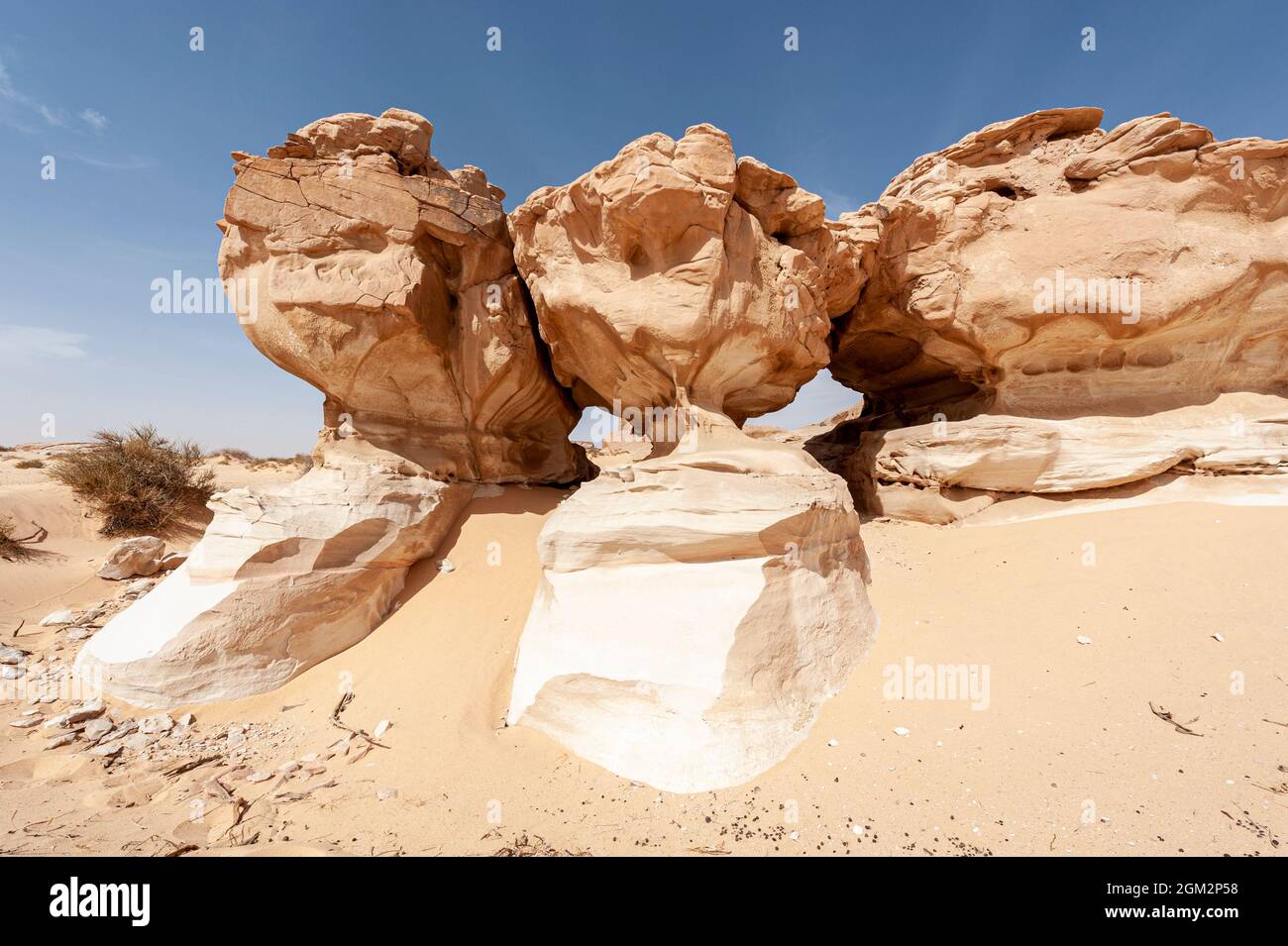 Sandstone rock formations of crazy shapes in the desert near Medina and ...